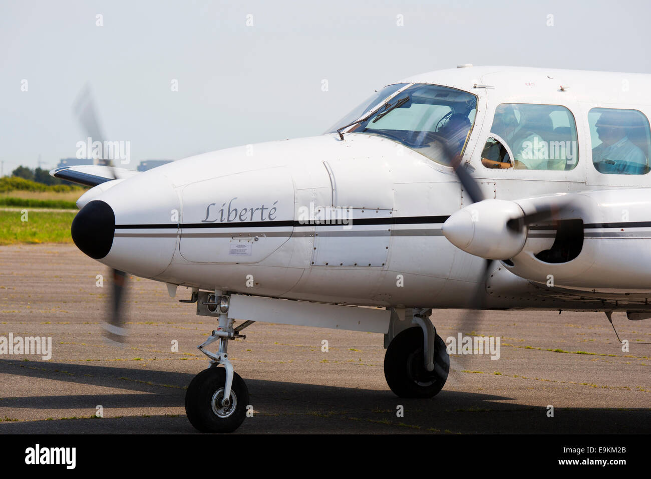 Piper PA-31-350 Navajo Chieftan close-up of nose area with engines ...