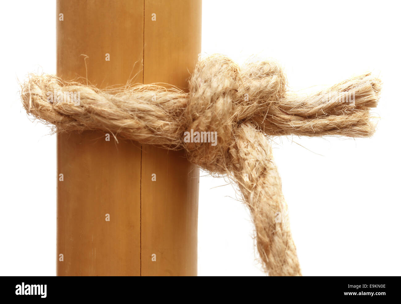 Rope knot on a bamboo over white background Stock Photo - Alamy