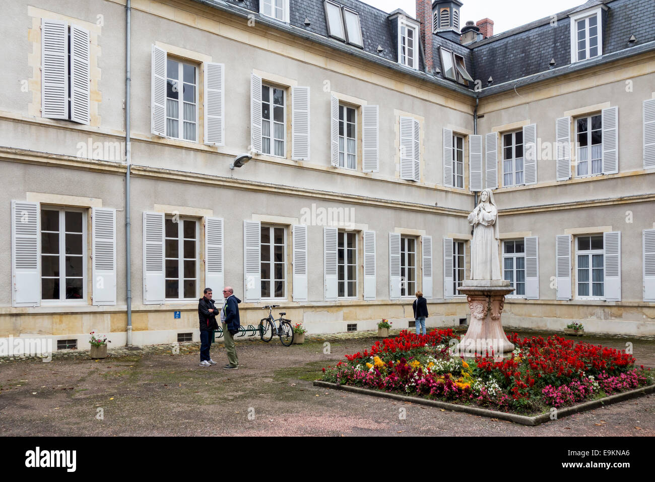 Statue of Bernadette Soubirous in the Espace Bernadette Soubirous at ...