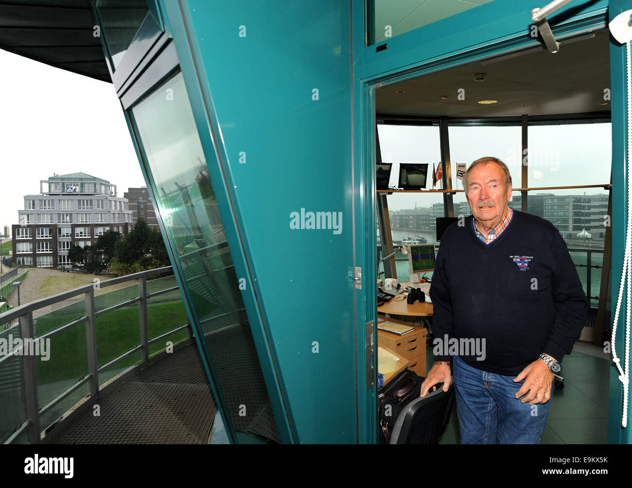 The lock operator sits at his command station and waits on sports boats ...