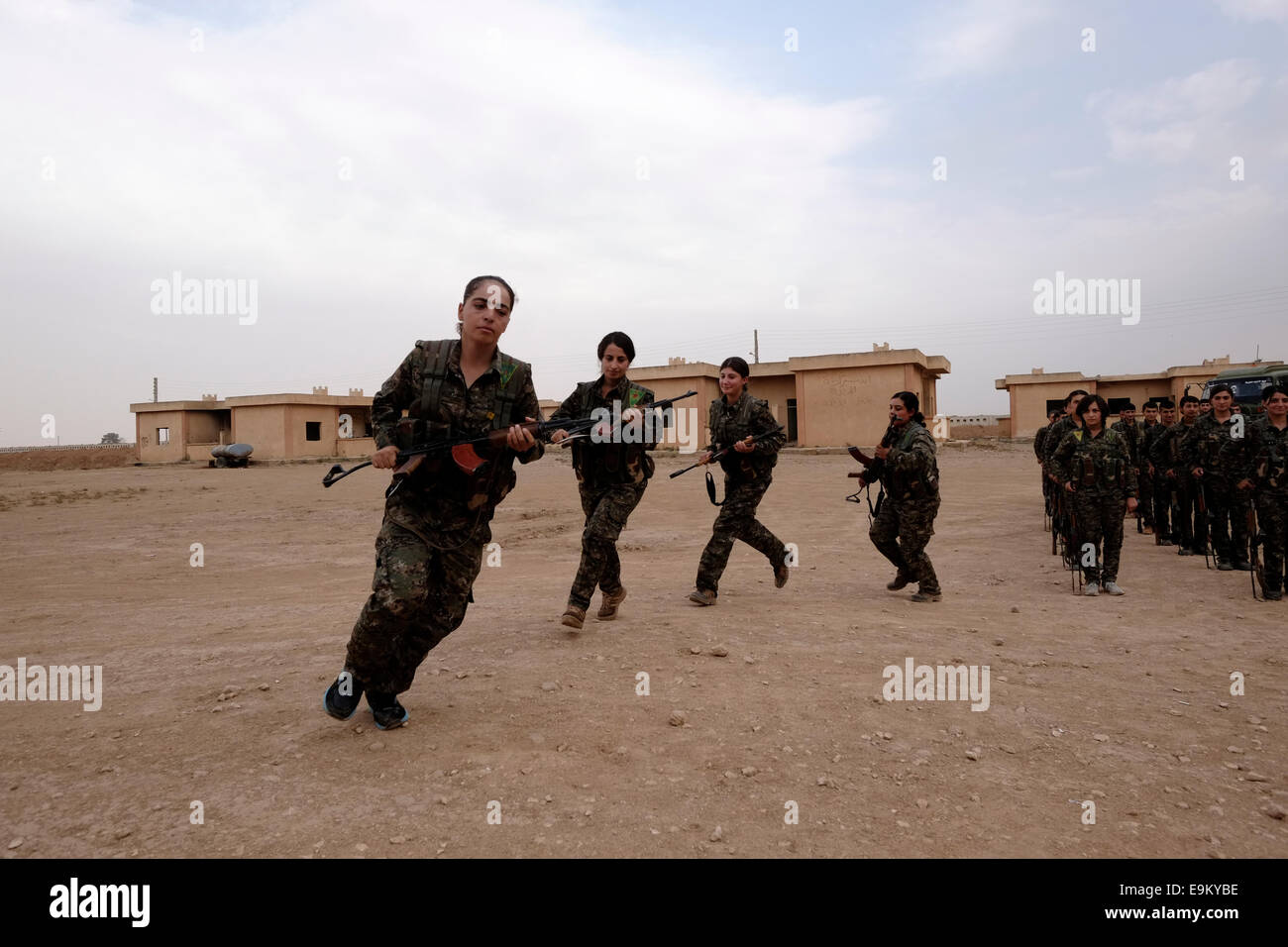 Kurdish fighters from the Women's Protection Units YPJ taking part in a ...
