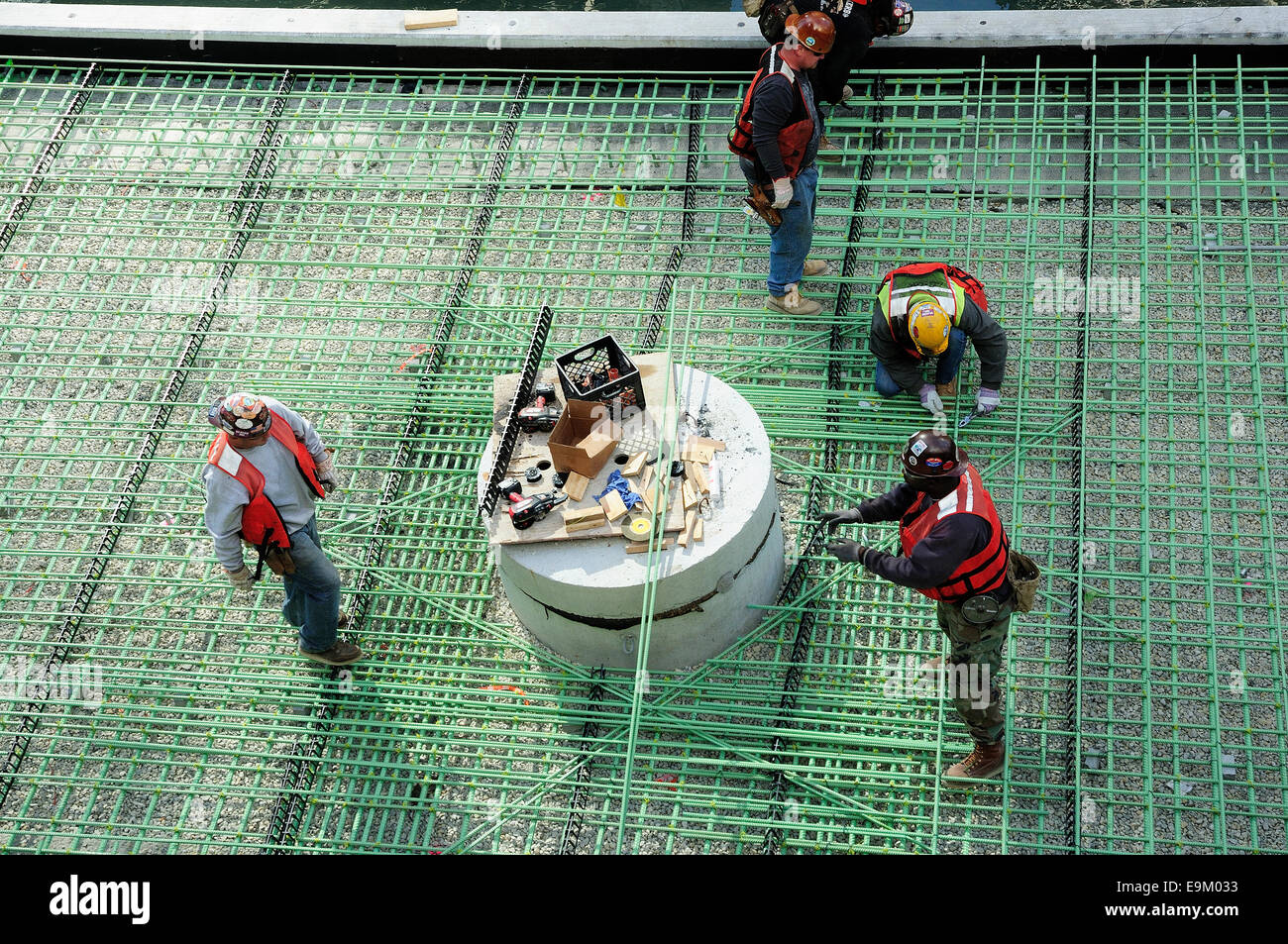 Chicago construction workers laying rebarb for the new "Riverwalk ...