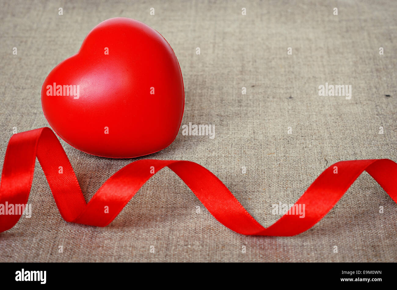 Big red heart on canvas background Stock Photo - Alamy