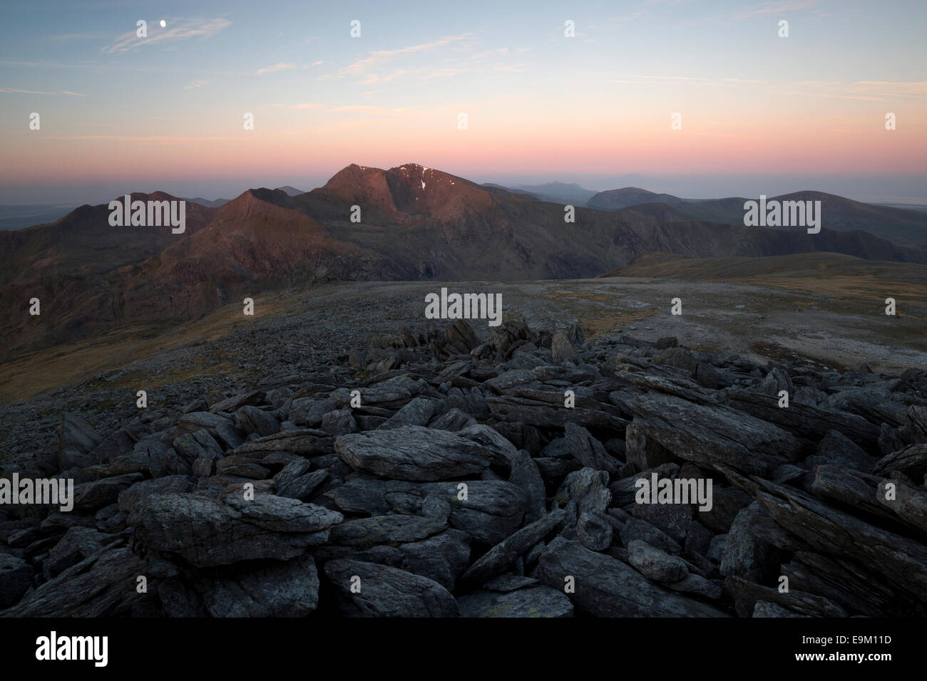 View of the Snowdon Massif from rocky Glyder Fach at dawn Stock Photo ...