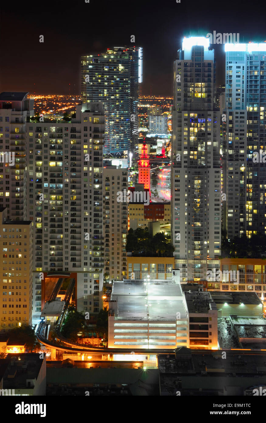 View of the Miami skyline at night with city lights and light trails ...