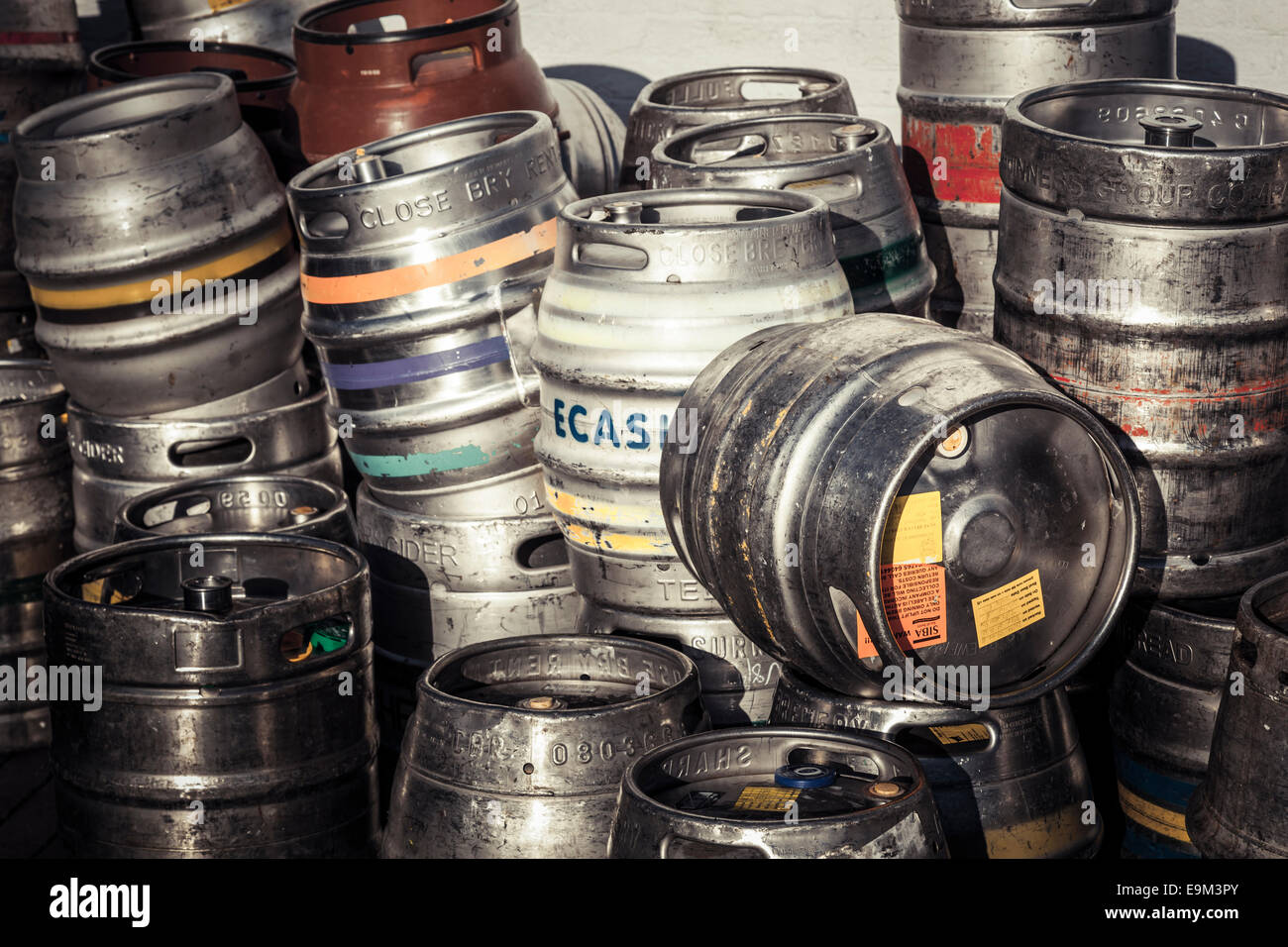 Stack of metal beer and cider kegs Stock Photo - Alamy