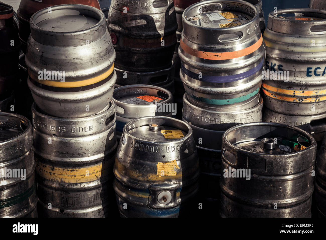 Stack of metal beer and cider kegs Stock Photo - Alamy