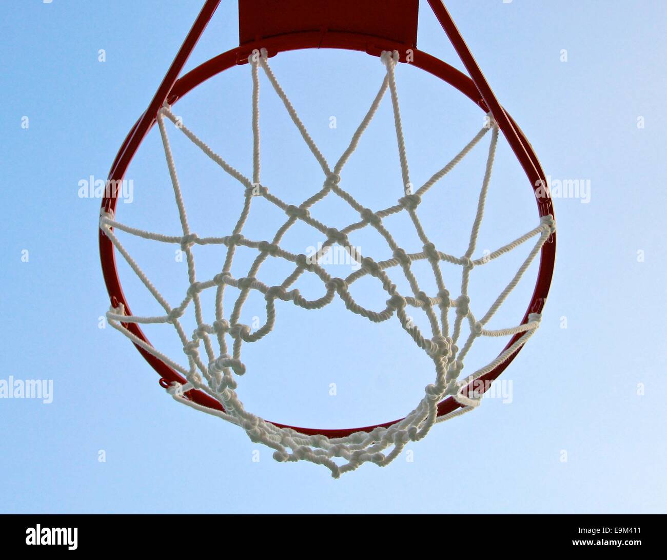 Basketball hoop with net in the playground Stock Photo - Alamy