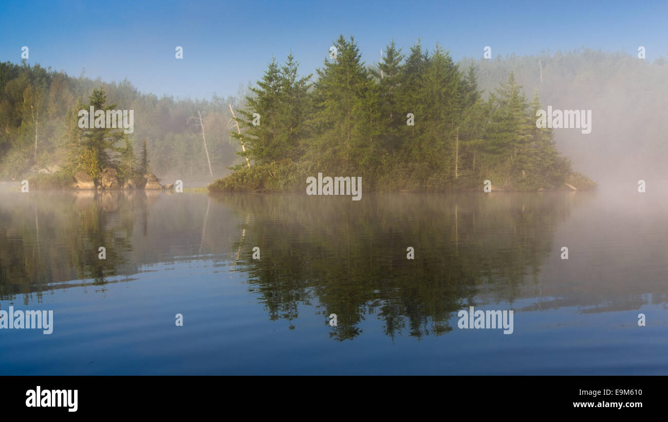 Mist over a Lake Stock Photo - Alamy