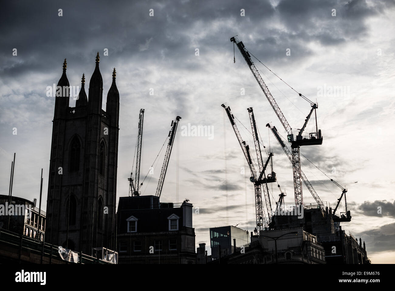 Multiple cranes on construction site hi-res stock photography and ...