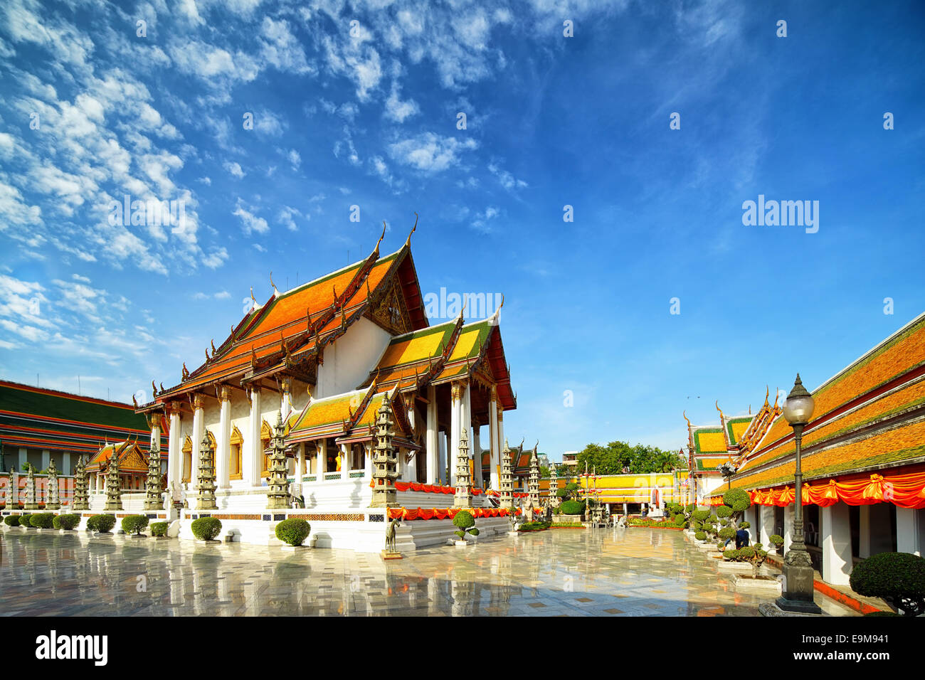 Wat Suthat Thepphawararam with blue sky background Stock Photo - Alamy