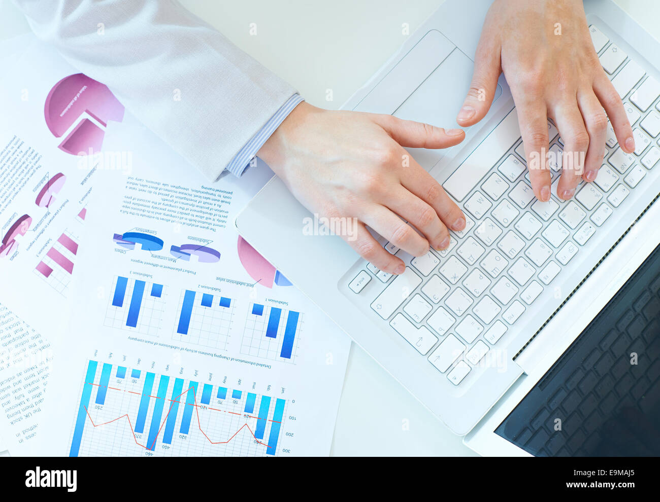 Hands of secretary pushing laptop buttons Stock Photo - Alamy