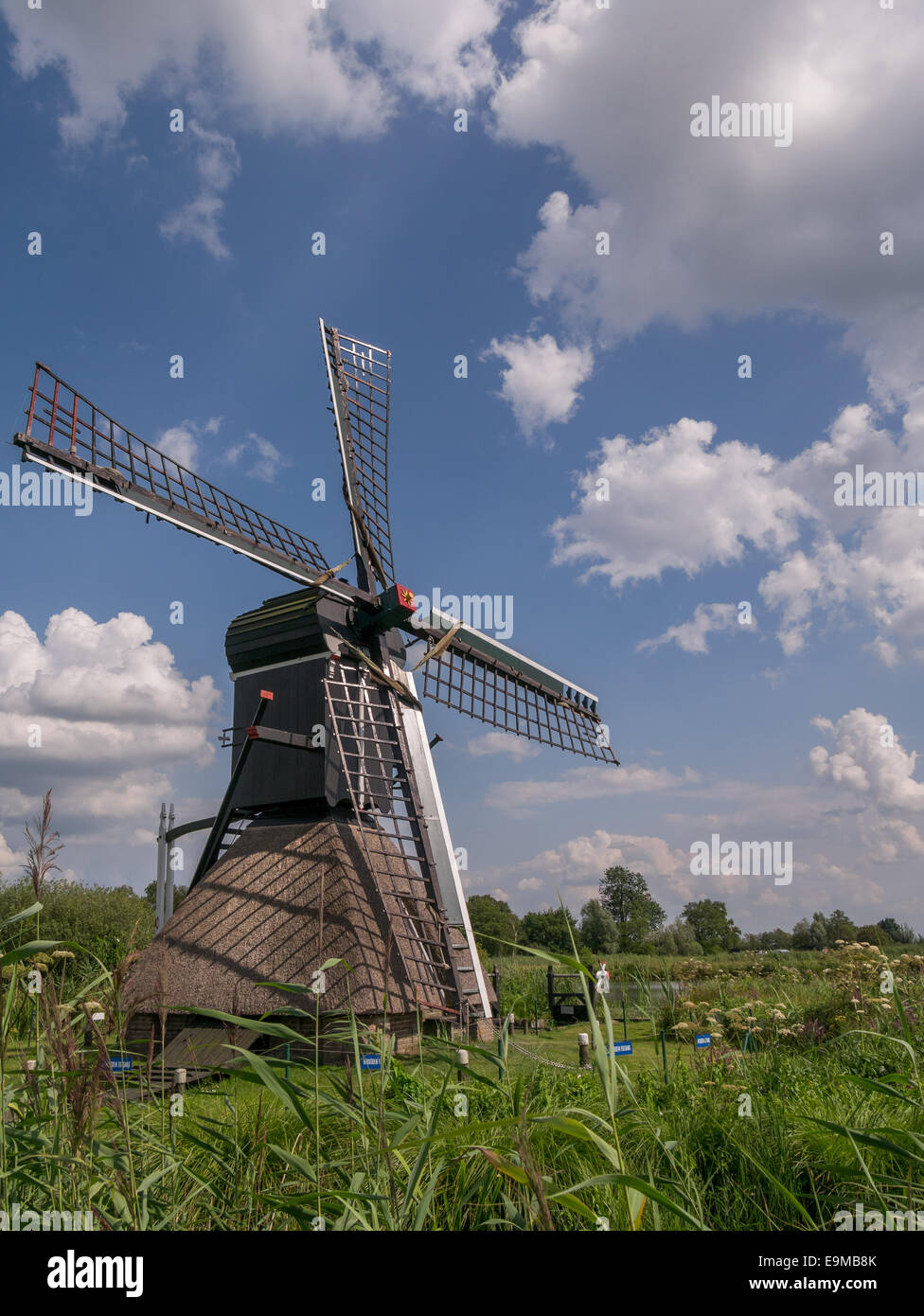 Typical Dutch view of a windmill in the summer in Drenthe Stock Photo ...