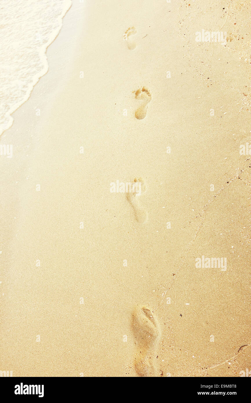 footprints on sand beach Stock Photo - Alamy