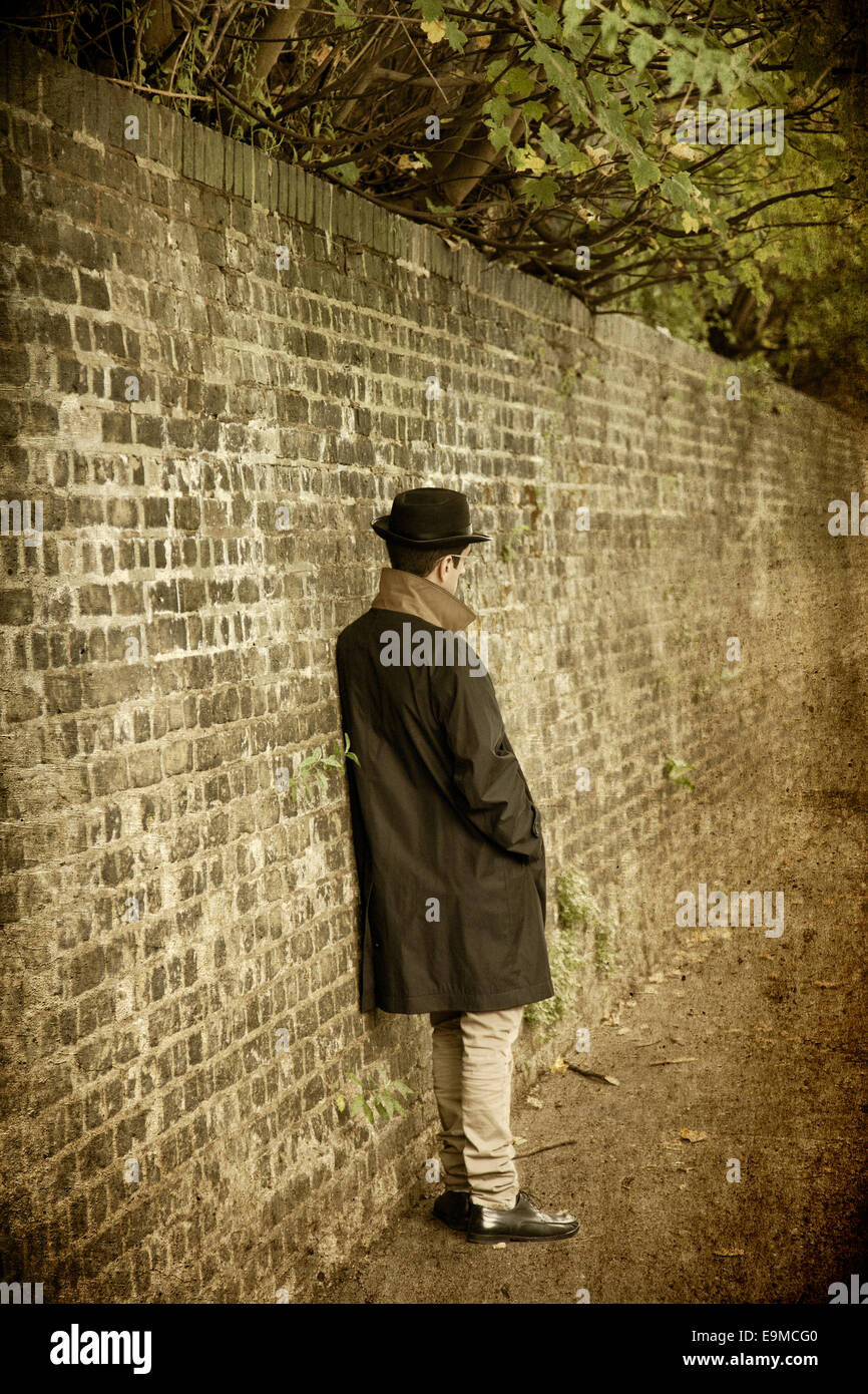 Man Standing on Alley Path Stock Photo - Alamy