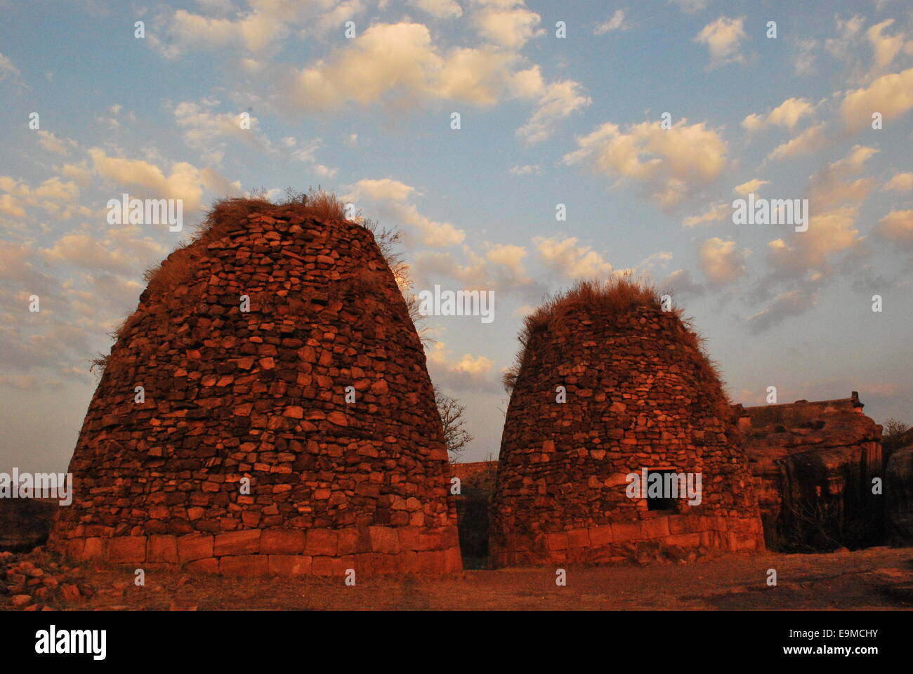 Ancient barns in the sunset Stock Photo - Alamy