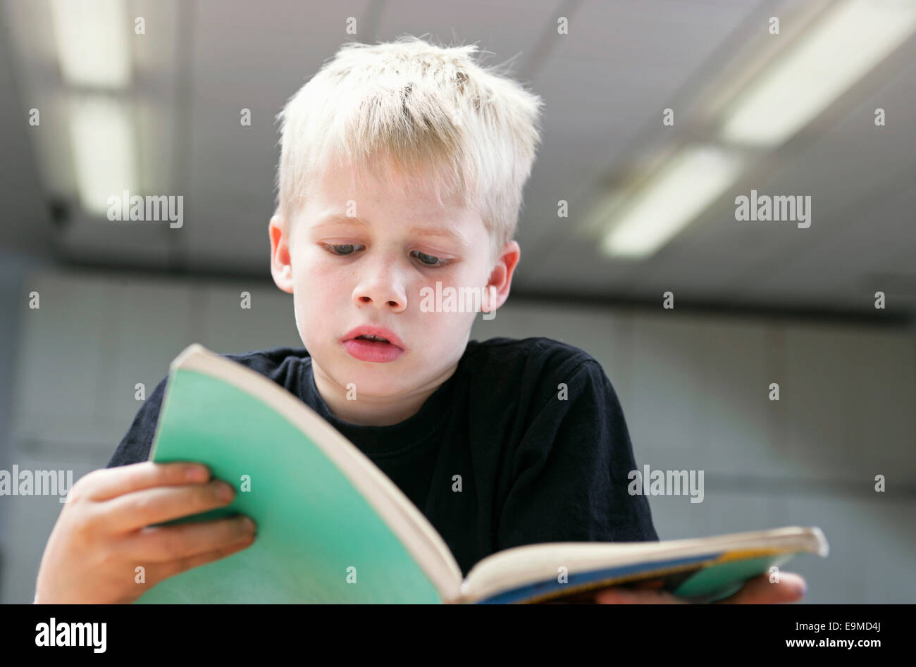 Blurred view person reading book hi-res stock photography and images ...