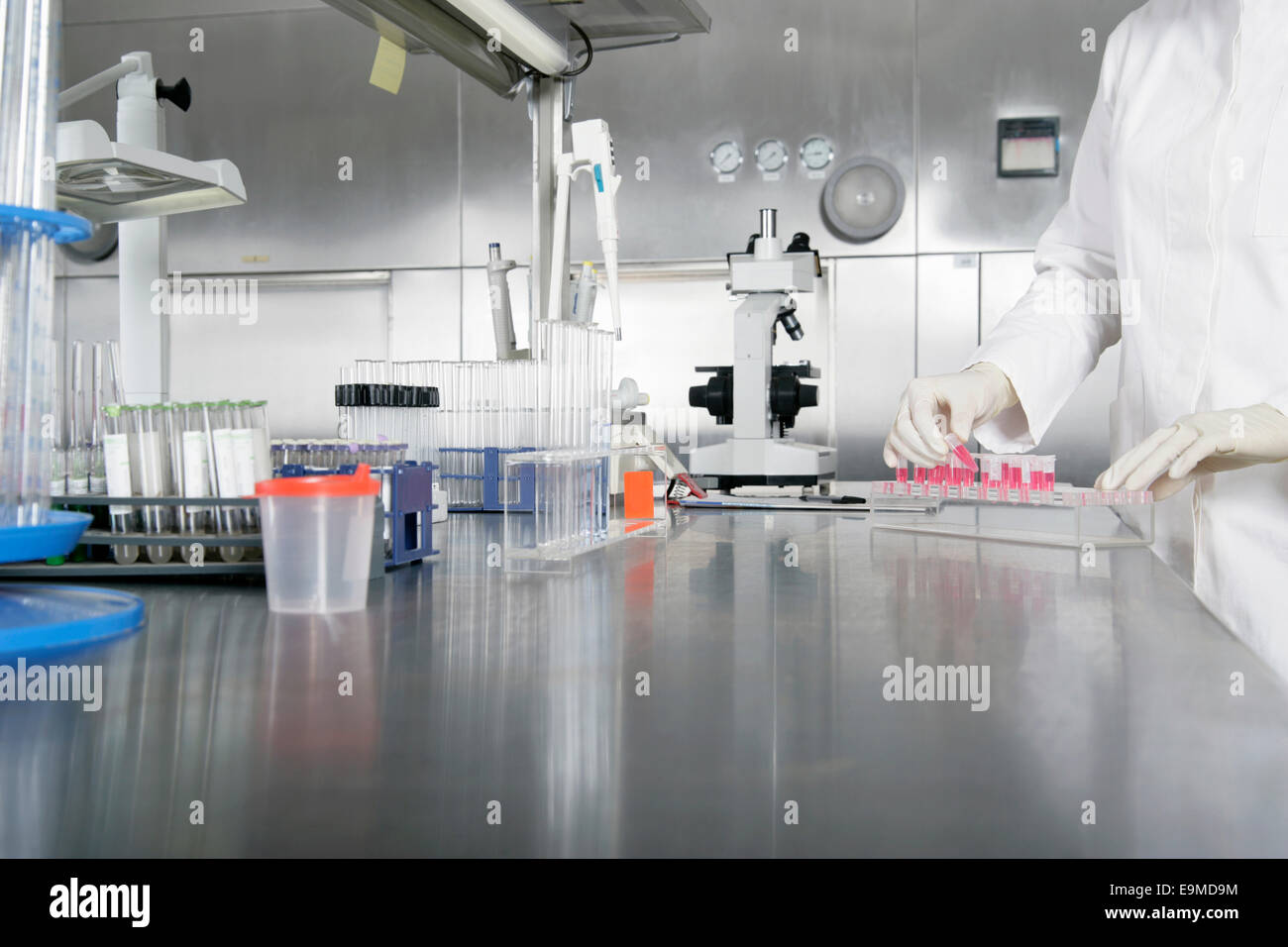 Test tubes with pink solution hi-res stock photography and images - Alamy