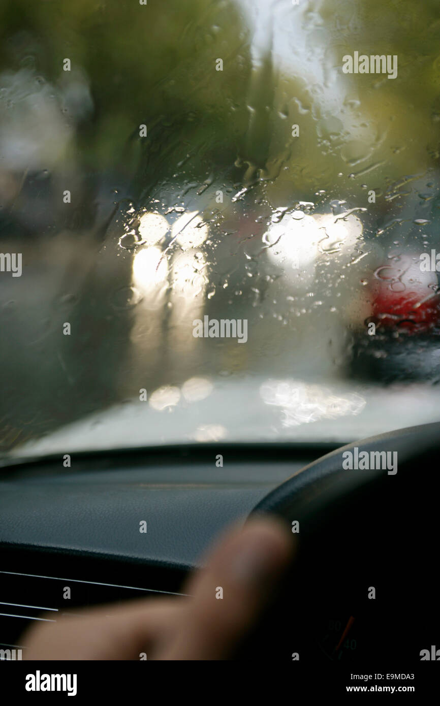 Blurred view of a road through the windshield of a car Stock Photo - Alamy