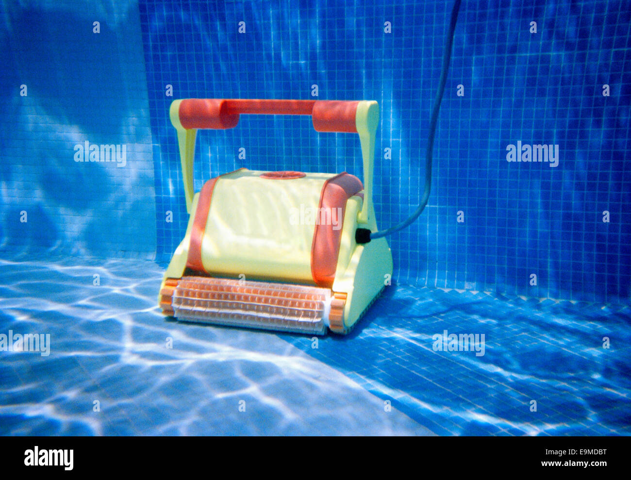 Pool cleaner underwater in swimming pool Stock Photo - Alamy