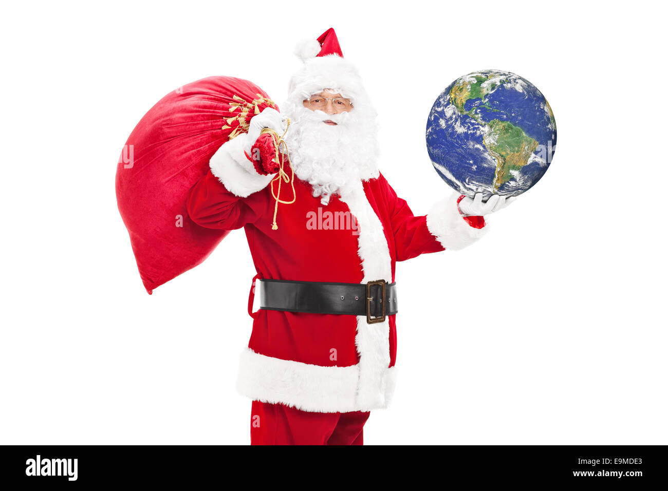Santa Claus holding bag of presents and the earth isolated on white ...