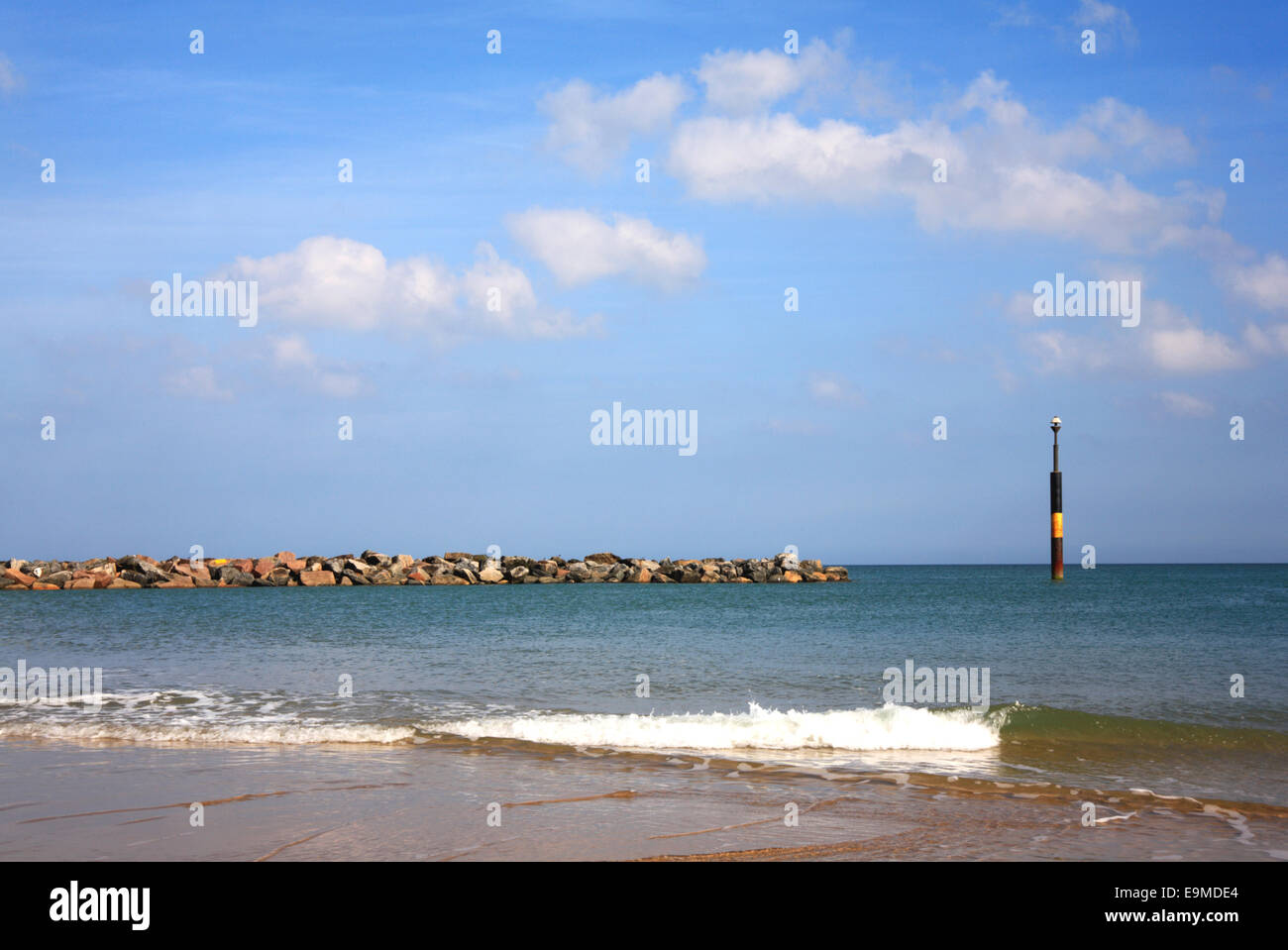 An artificial reef and marker post on the Norfolk coast at Sea Palling ...