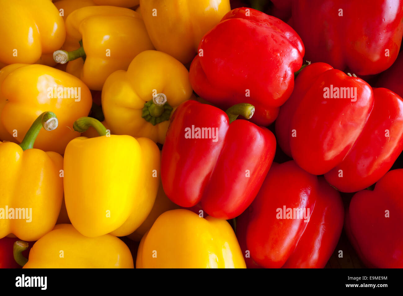 Yellow and red peppers Stock Photo - Alamy