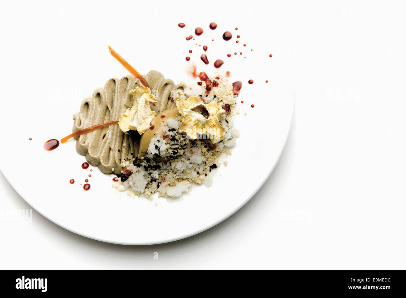Garnished mushroom dish served in plate over white background Stock ...