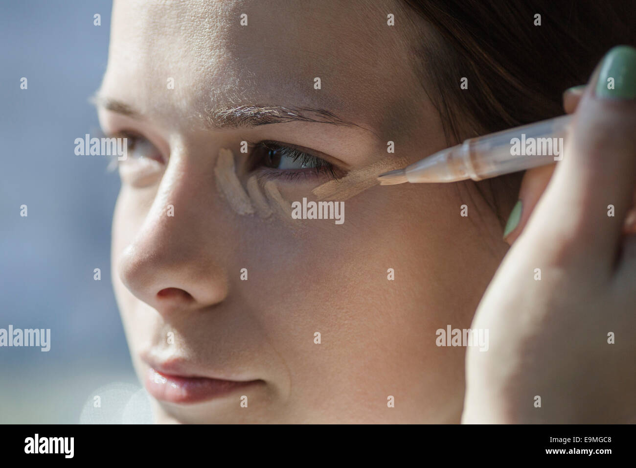 Close up woman applying face hi-res stock photography and images - Alamy