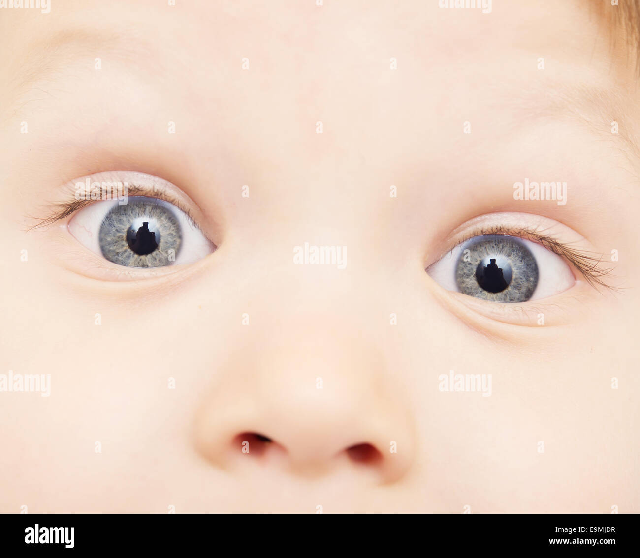 close up of surprised baby face Stock Photo - Alamy