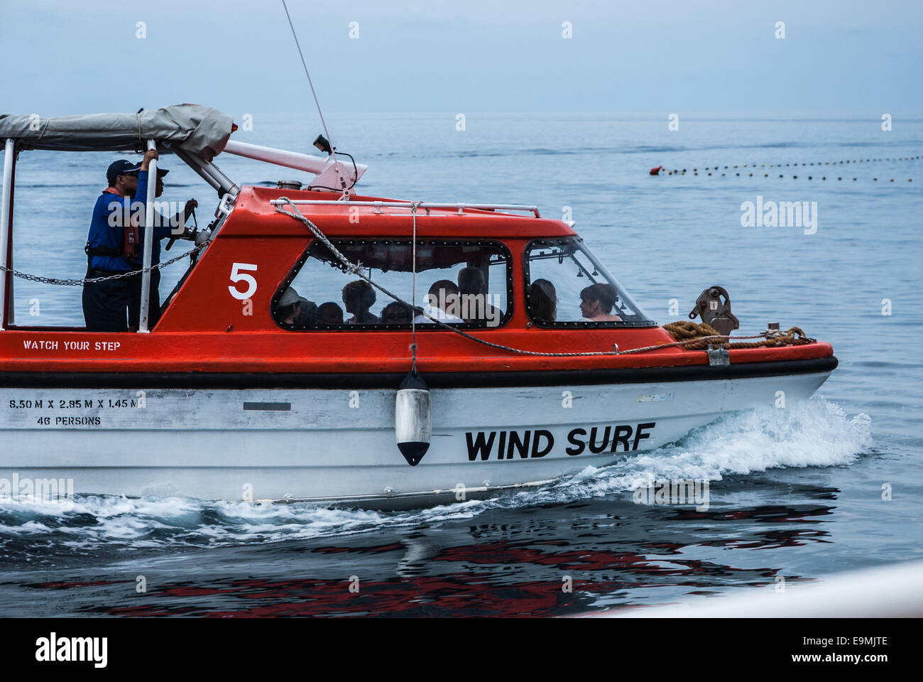 `Wind Surf' tender boat with passengers Stock Photo - Alamy