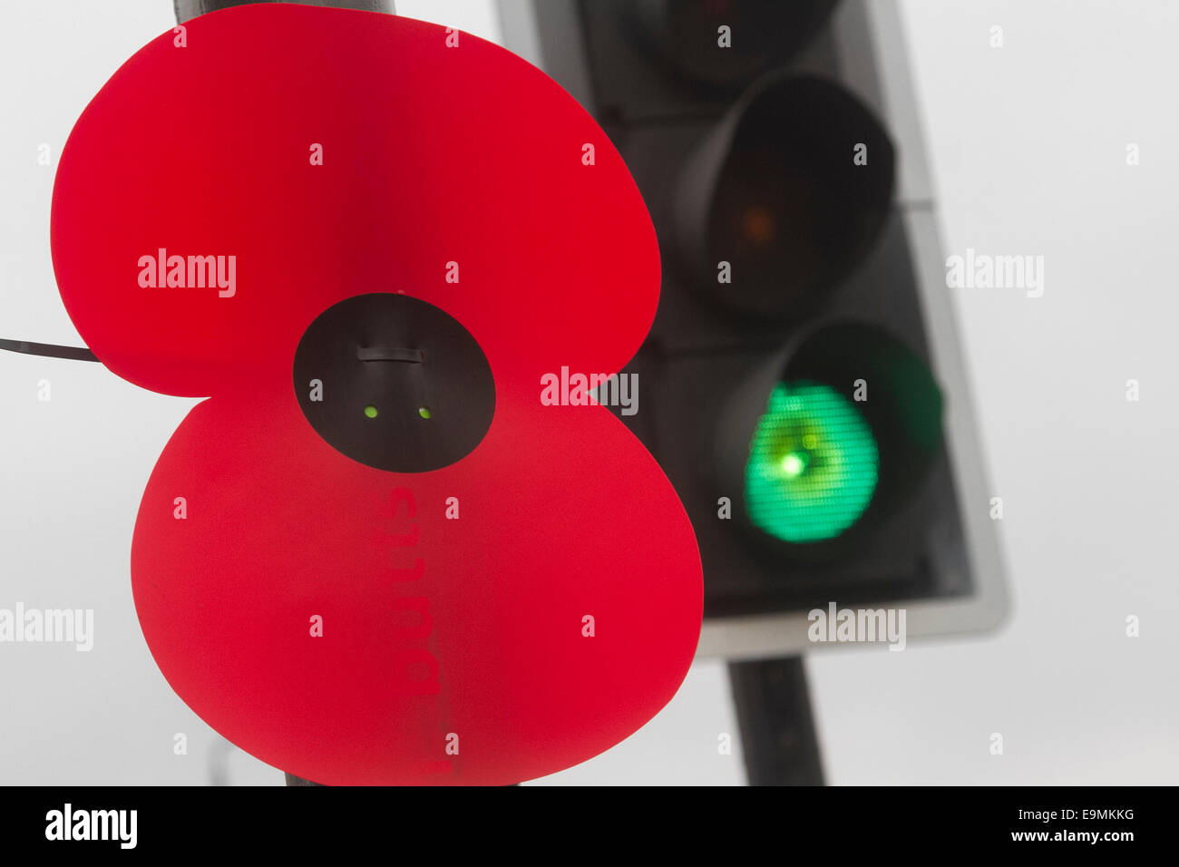 London, UK. 30th October, 2014. Red Poppies decorate bus stops along ...