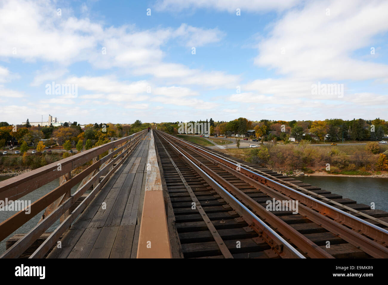 pedestrian walkway and train tracks cpr train railway bridge over the ...