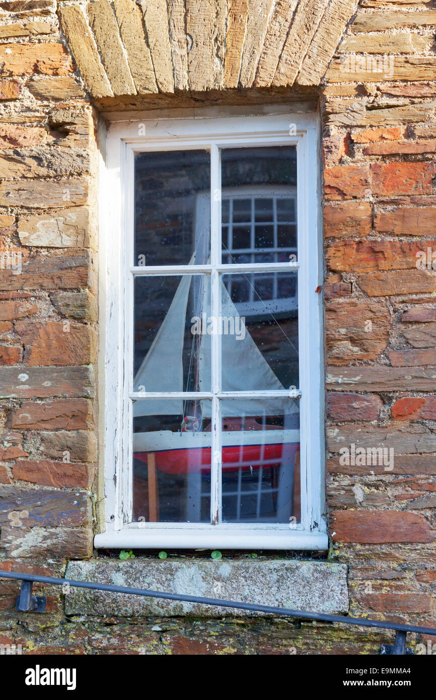 Window with sailing ship model Stock Photo - Alamy