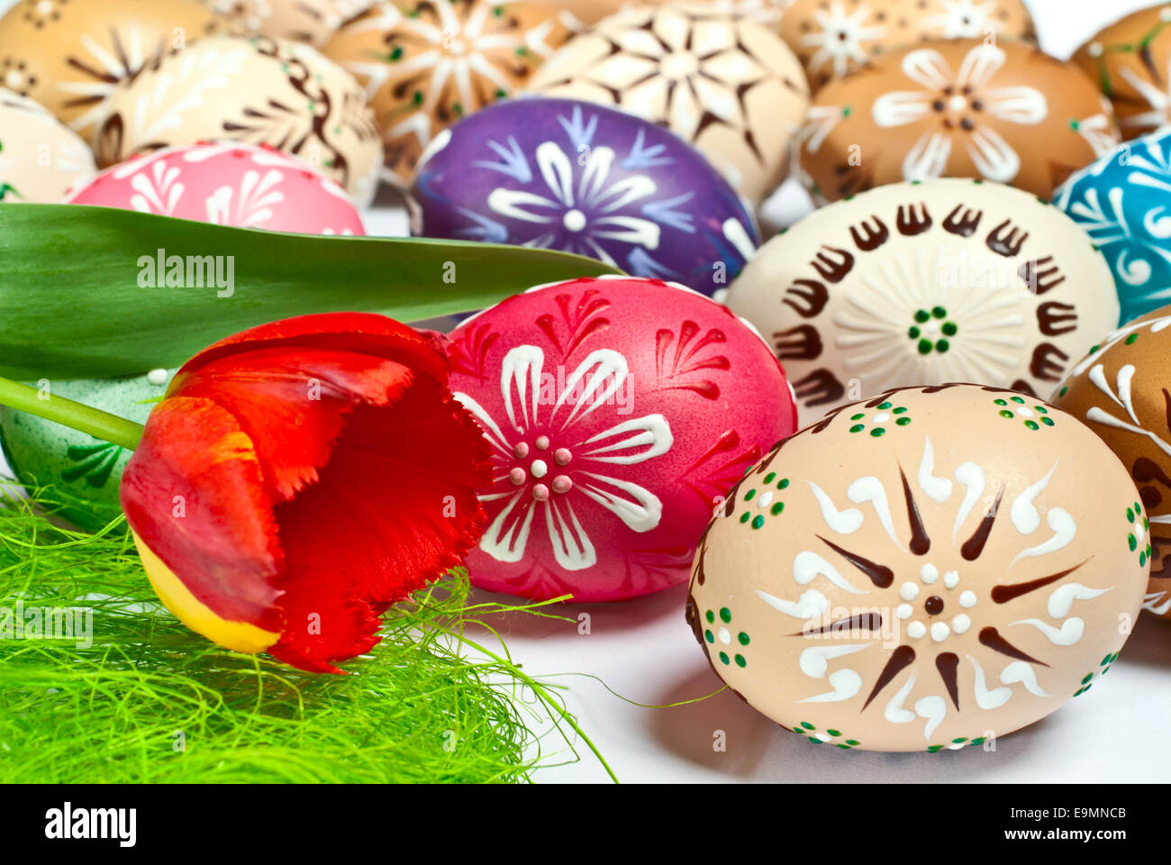 still life with Eater eggs and red tulips Stock Photo - Alamy