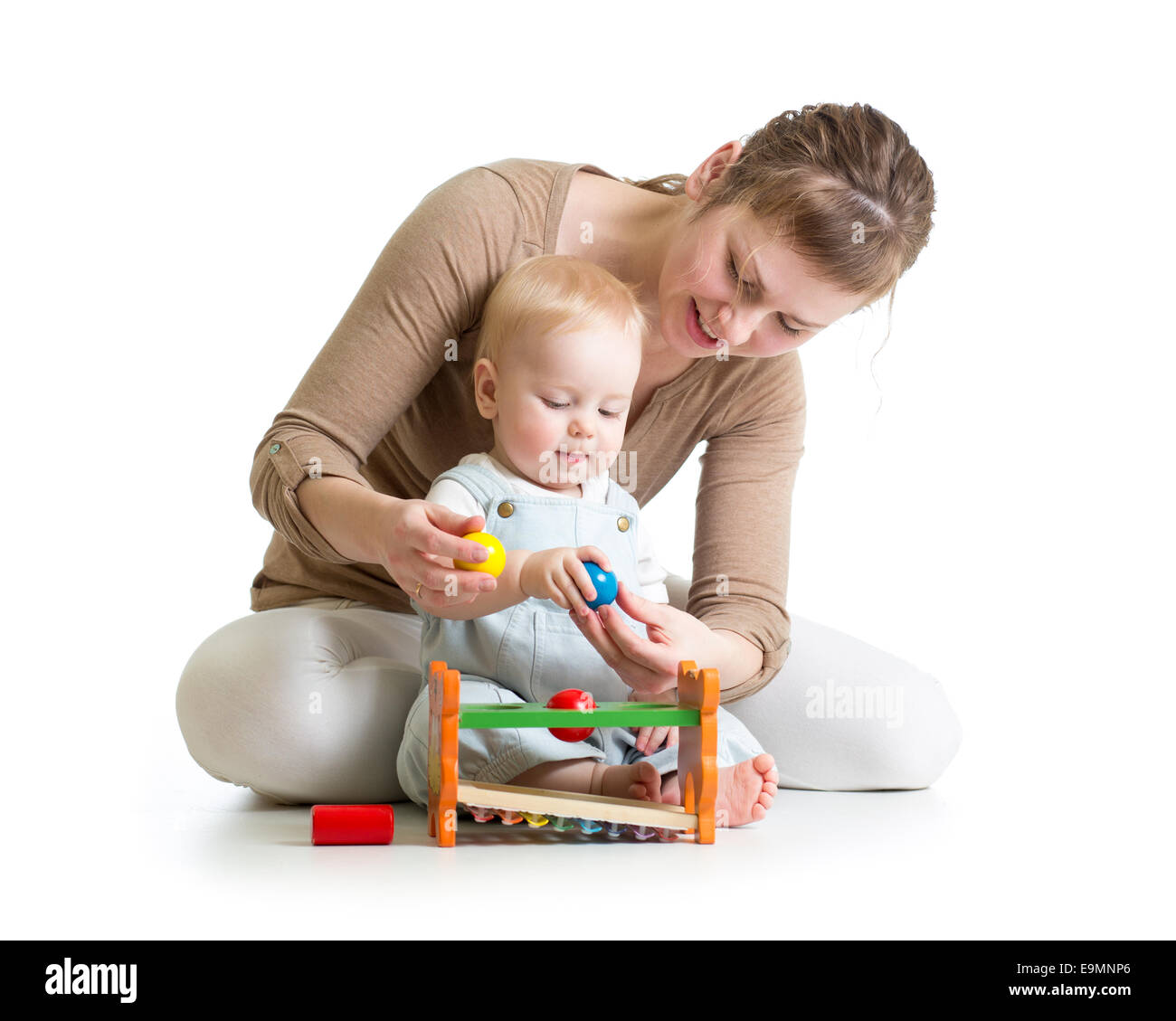 mom and play musical toy Stock Photo - Alamy
