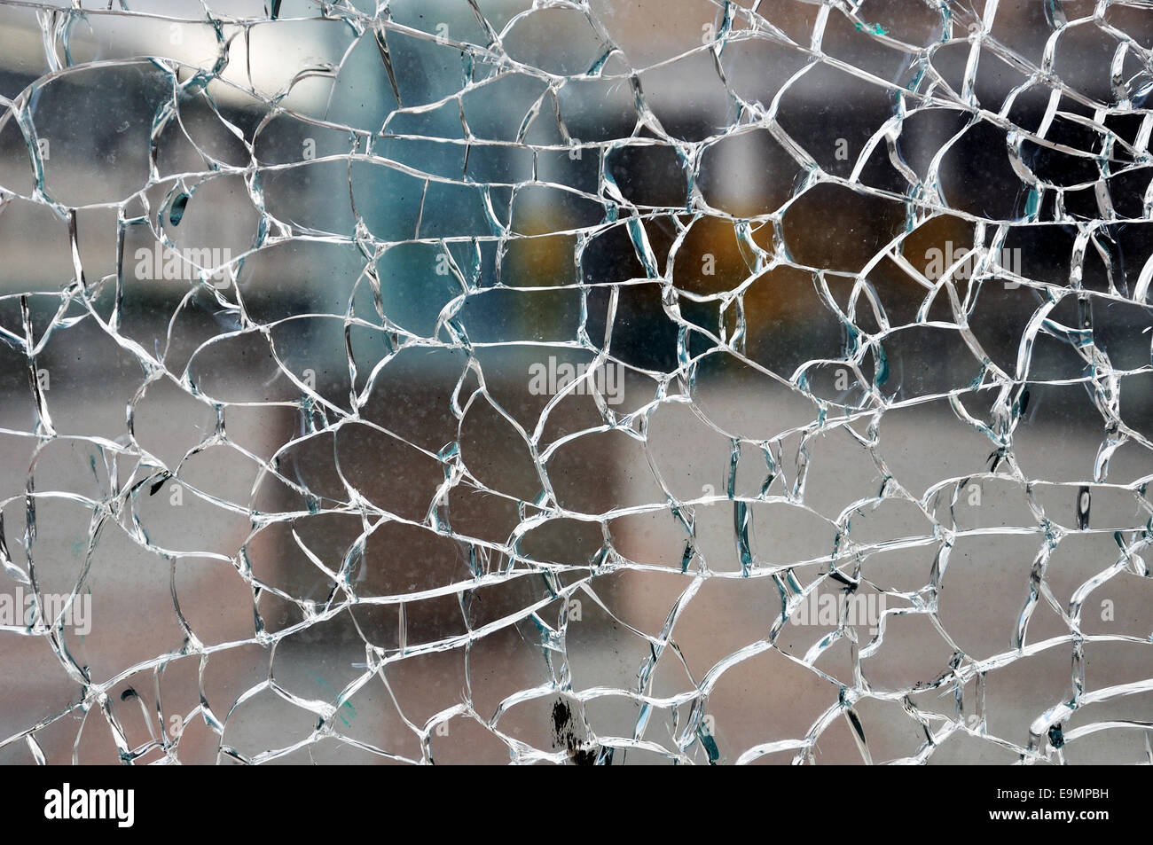 Broken glass cracked destroyed hole hi-res stock photography and images ...