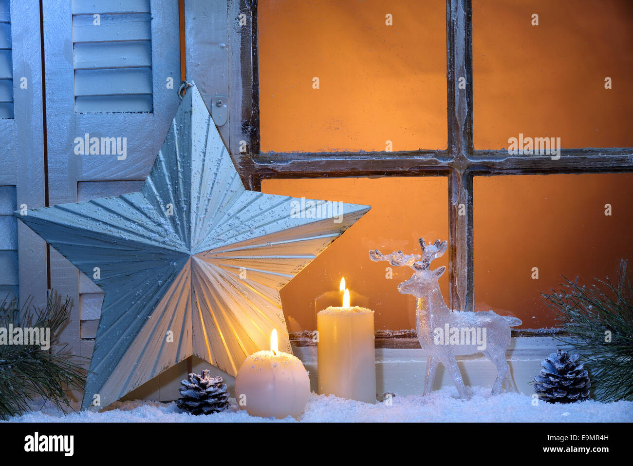 Frosted window with Christmas decoration Stock Photo - Alamy