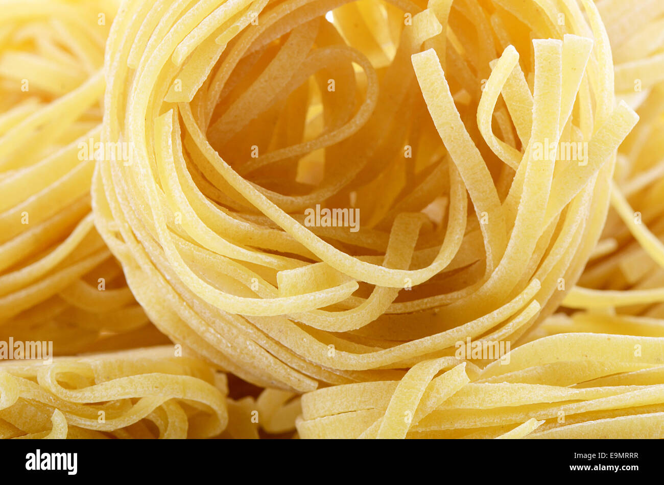 Uncooked pasta spaghetti macaroni Stock Photo - Alamy