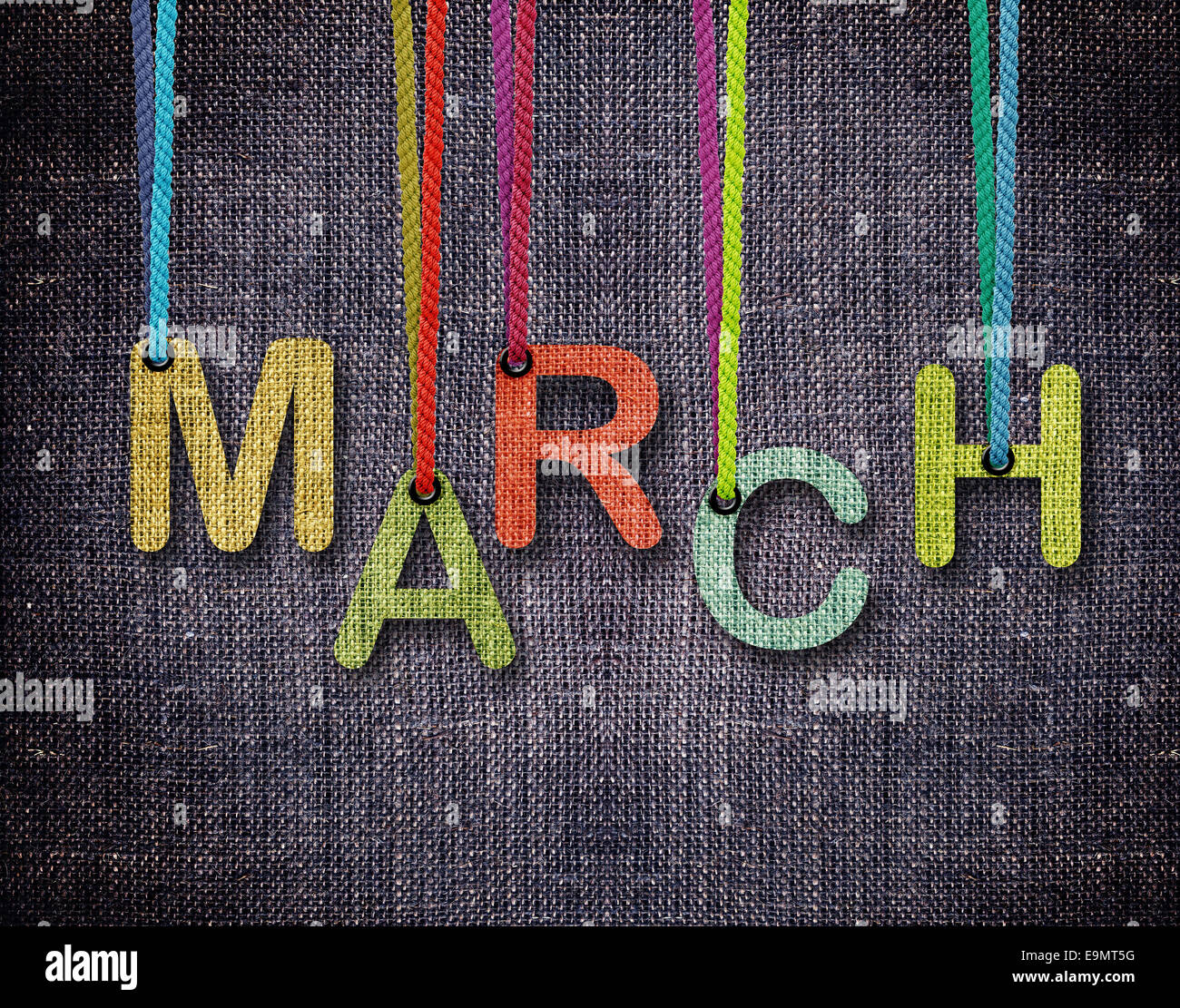 Letters hanging strings Stock Photo - Alamy