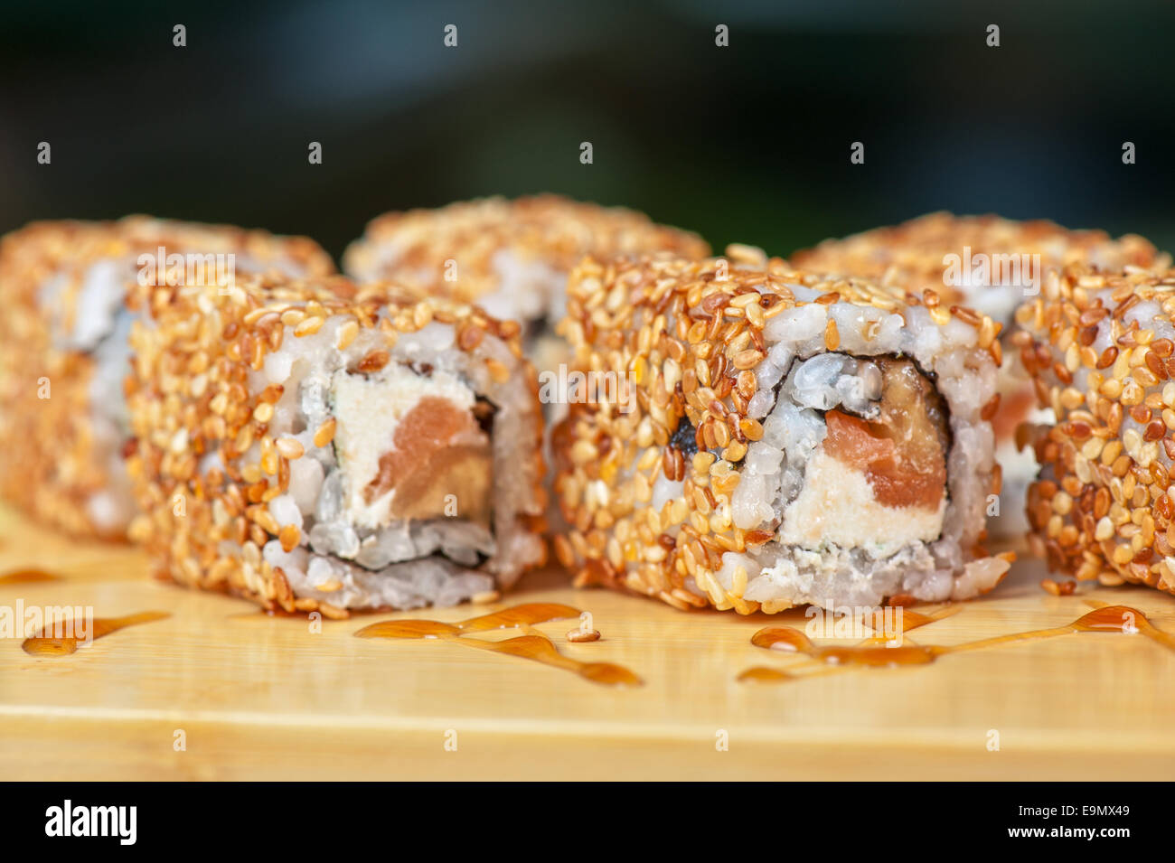 sesame sushi rolls Stock Photo - Alamy