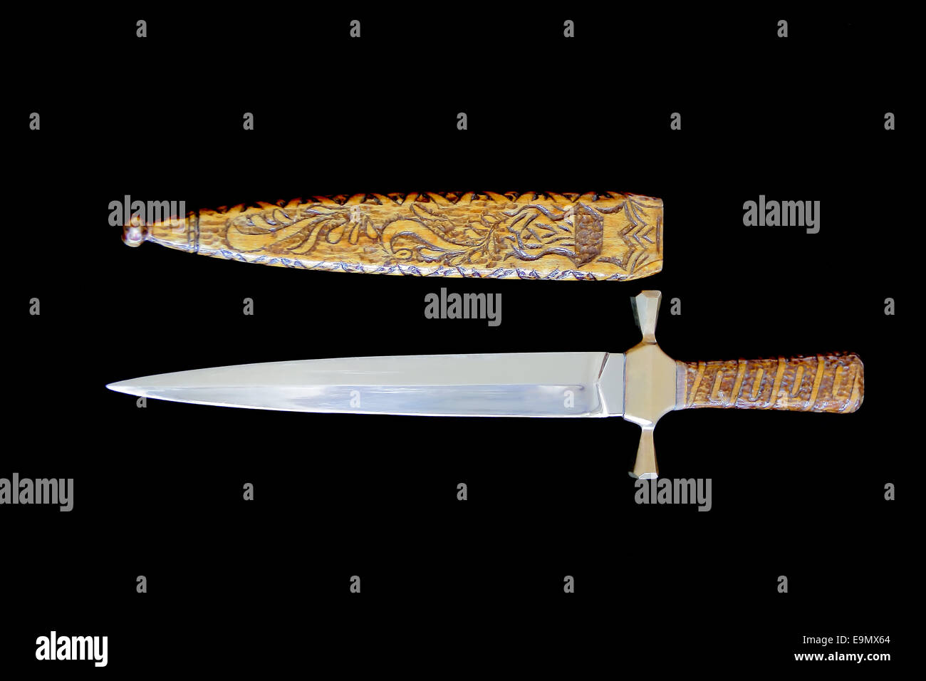 Cold weapon on black background Stock Photo - Alamy