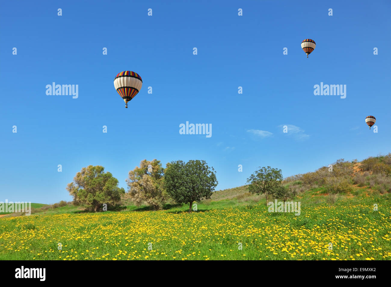 Three bright balloons Stock Photo - Alamy