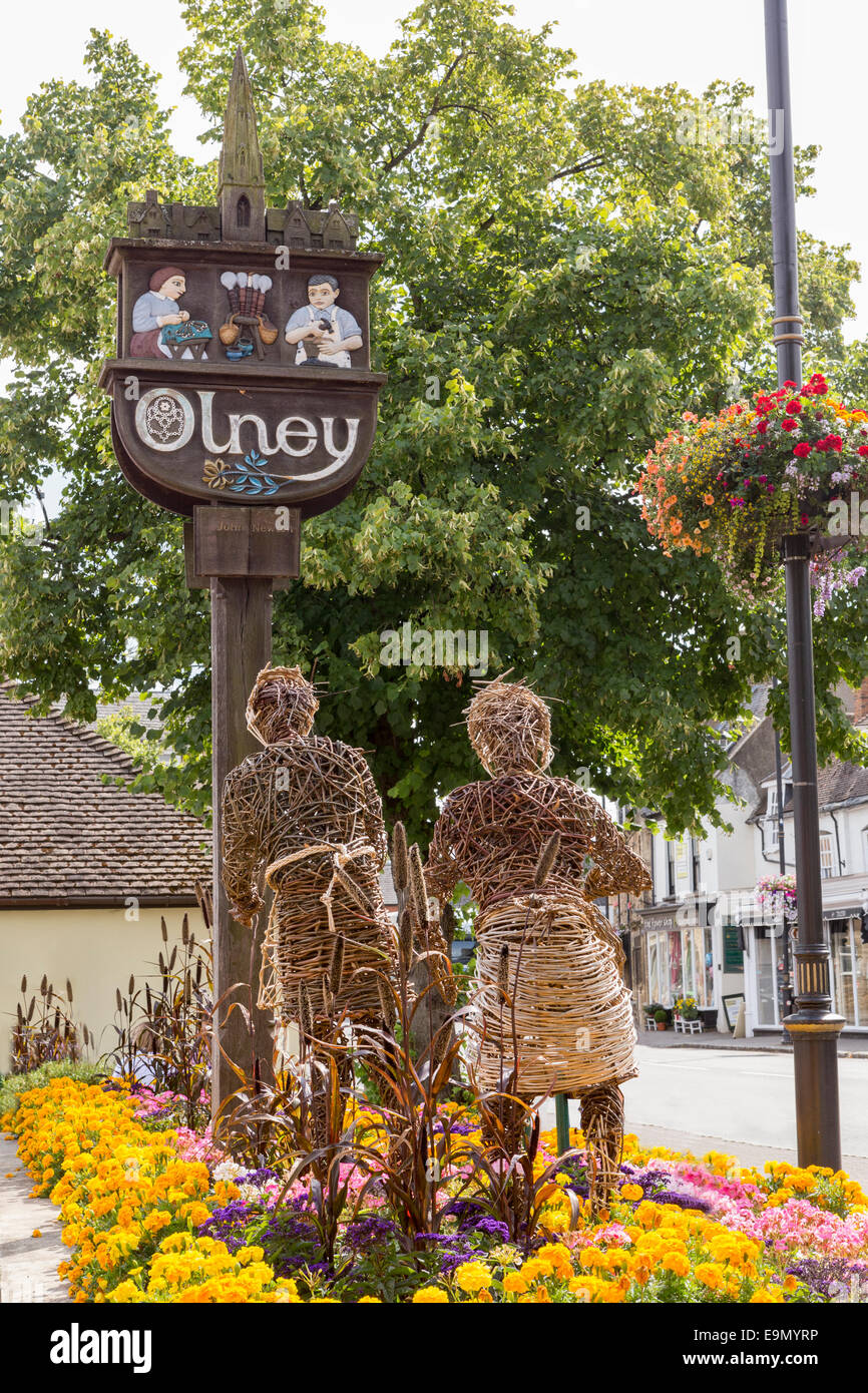 Olney Sign and Wicker Pancake Racers Stock Photo - Alamy