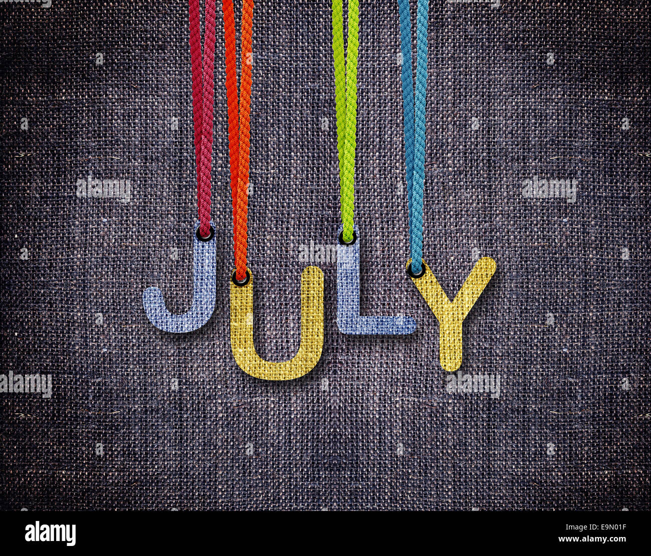 Letters hanging strings Stock Photo - Alamy