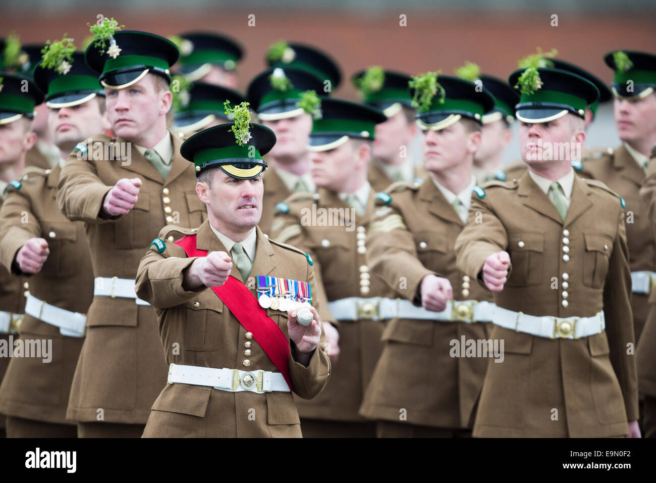 Soldiers from the 1st Battalion the Irish Guards march past the Duke ...