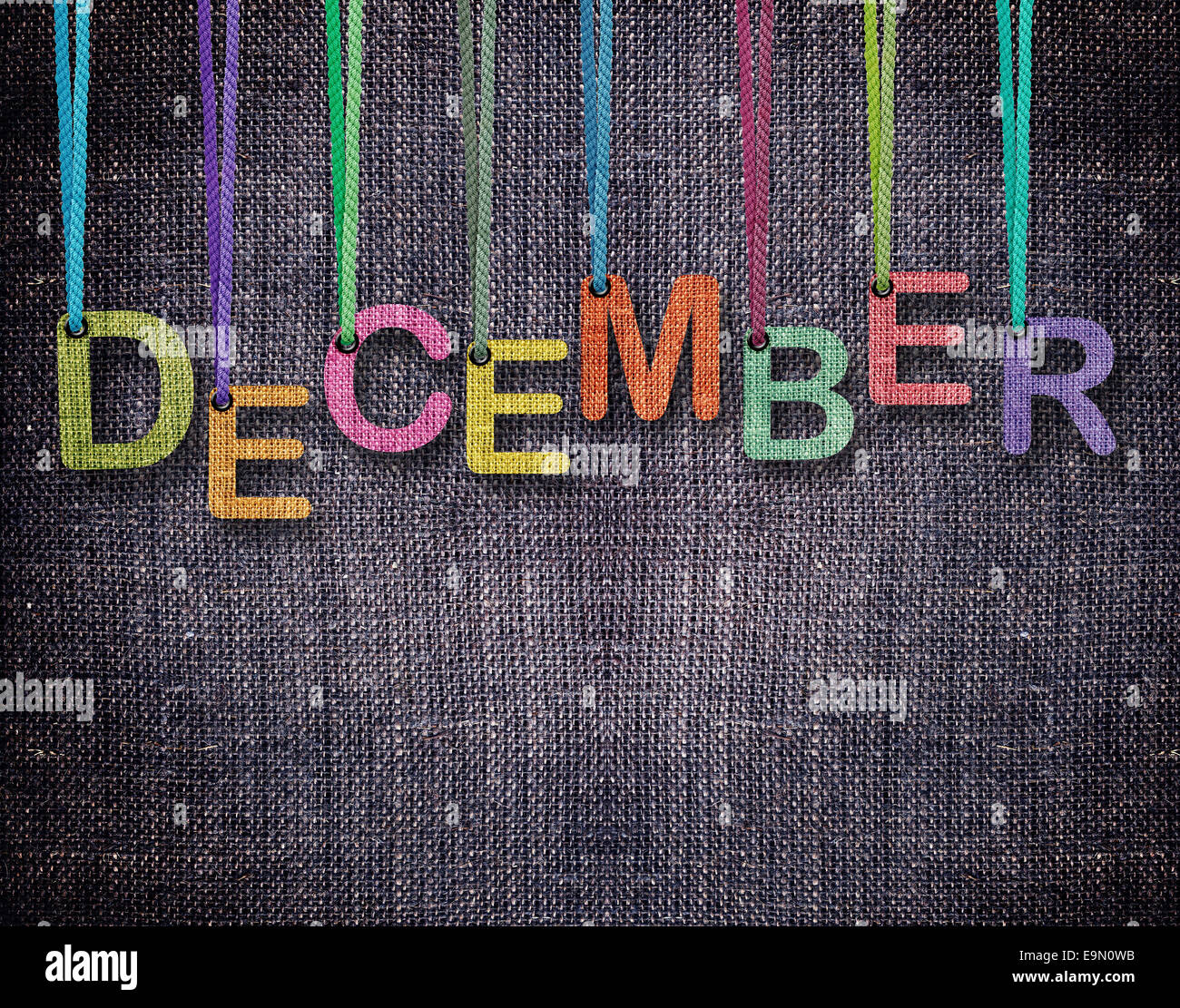 Letters hanging strings Stock Photo - Alamy