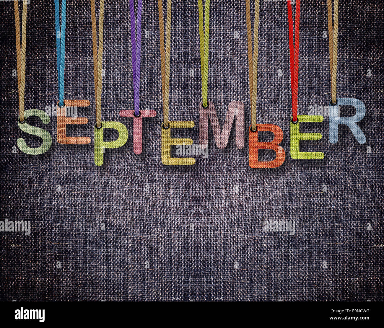 Letters hanging strings Stock Photo - Alamy