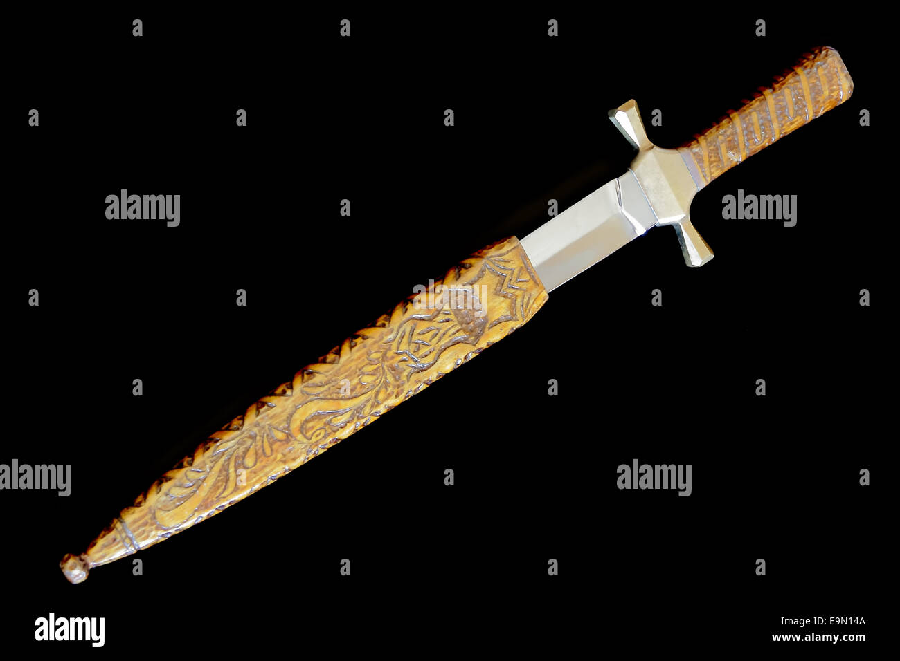 Cold weapon on black background Stock Photo - Alamy