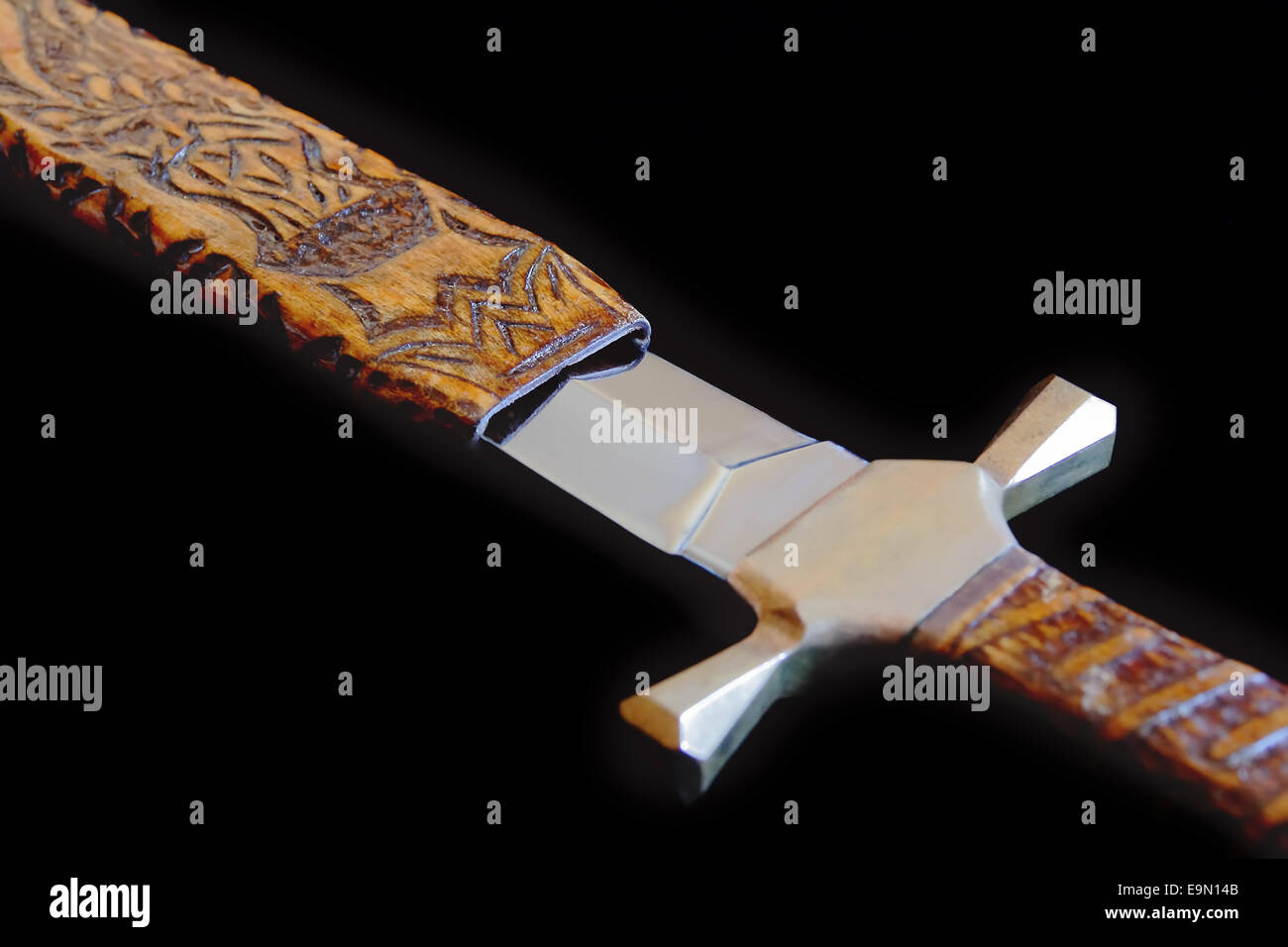 Cold weapon on black background Stock Photo - Alamy